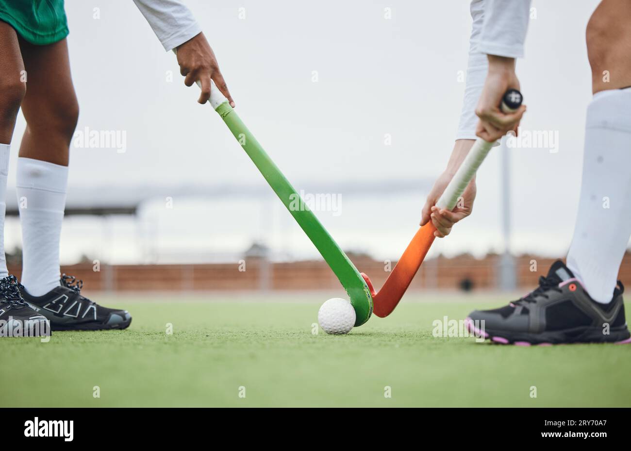 Fitness, hockey and women with sticks and ball on field for training ...