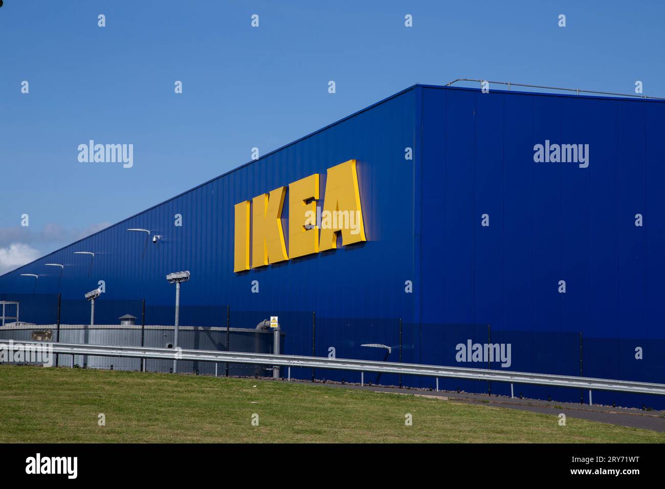 simple colourful cross section of Ikea in Exeter against blue sky, and ...