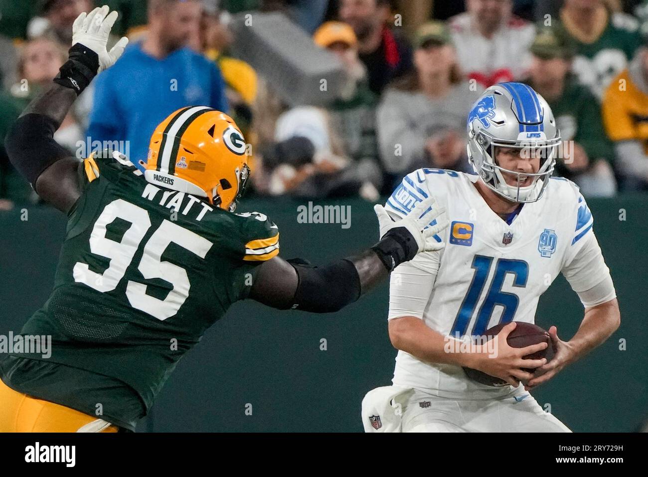 Green Bay Packers' Devonte Wyatt rushes Detroit Lions' Jared Goff ...