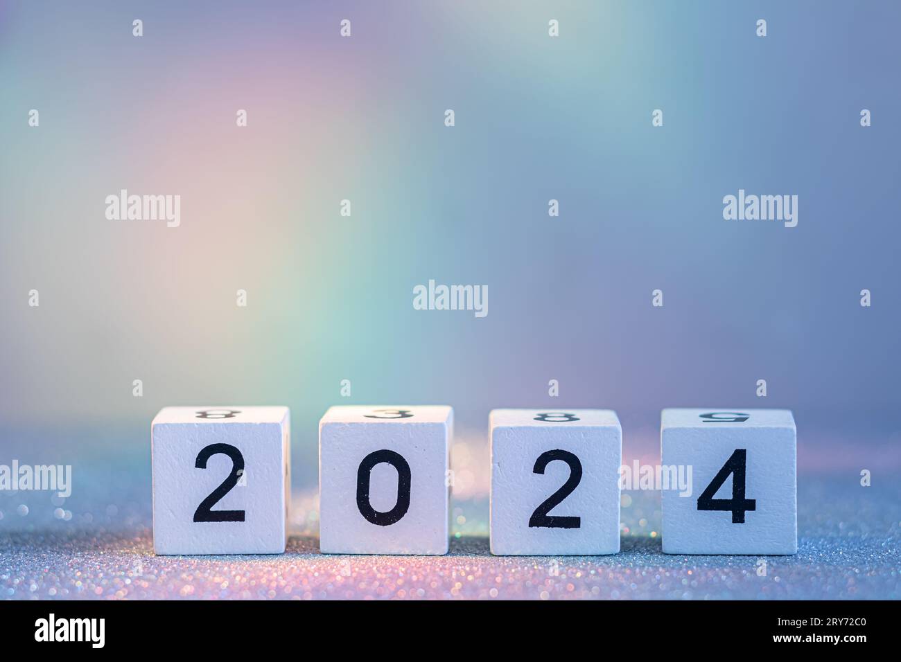 2024 New Year Coming. White Wooden Blocks With 2024 Number On Glitter ...