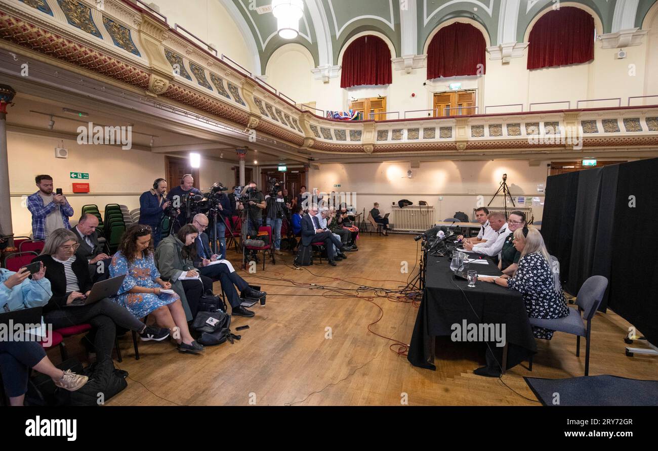 (Top to bottom sat at table) Graeme Robson, Chief Superintendent ...