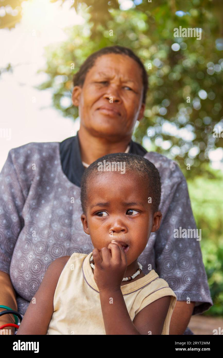 a bushmen San woman from Central Kalahari, village New Xade in Botswana ...