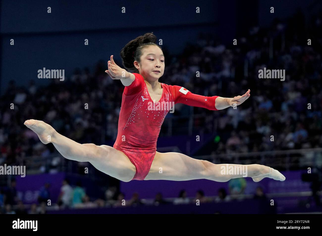 Japan's Mana Okamura competes in the Artistic Gymnastics women's floor ...