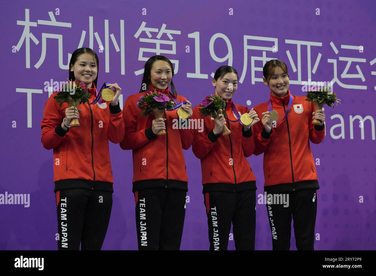 Team Japan celebrates their gold medal in the women's 4x100m Medley ...