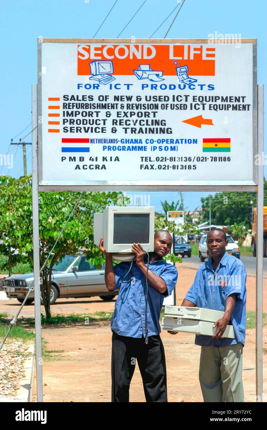 Ghana, Accra. Mechanics of computer recycling company with overhauled ...