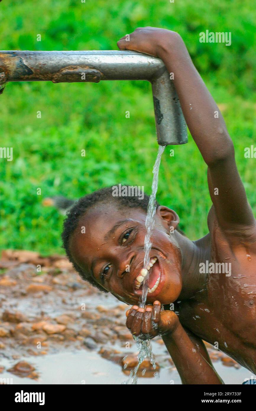 Ghana boy water hi-res stock photography and images - Alamy