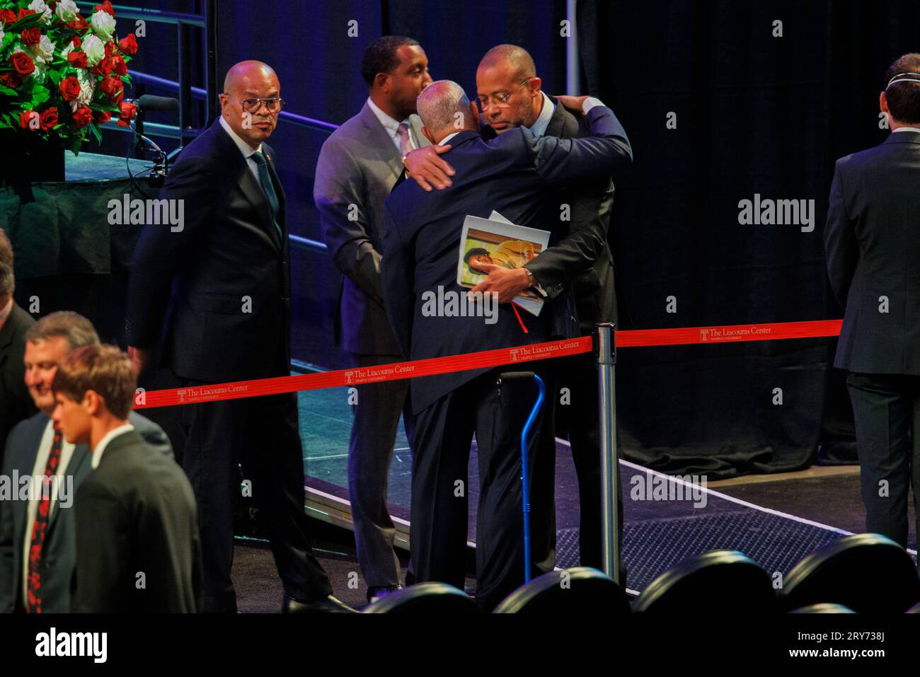 L. Harrison Jay, husband of late JoAnne A. Epps, is embraced after ...