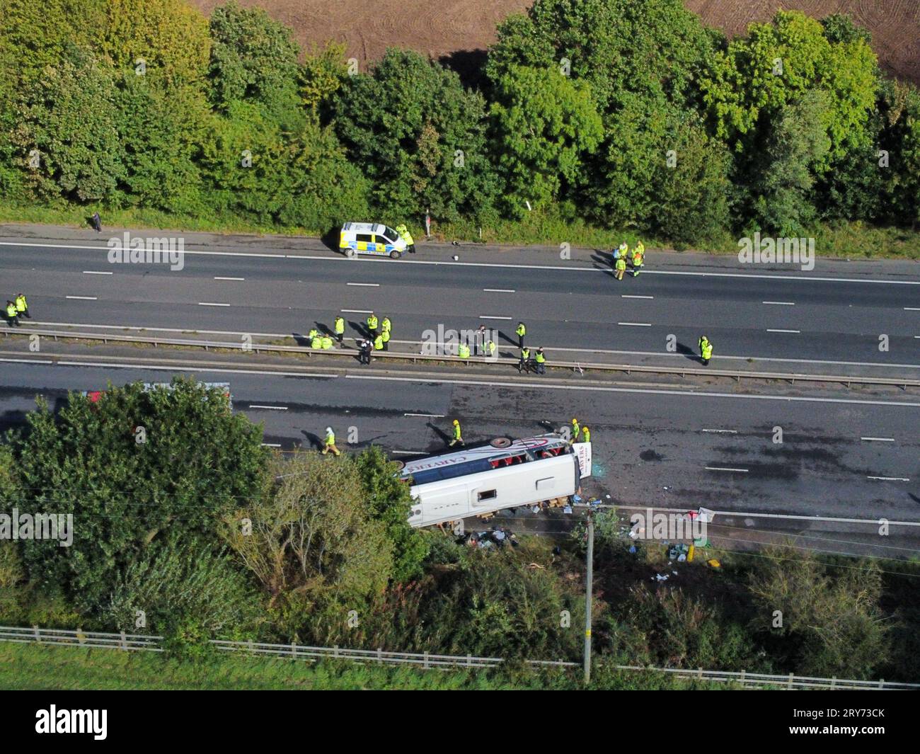 Emergency services at the scene of a coach crash on the M53 motorway ...
