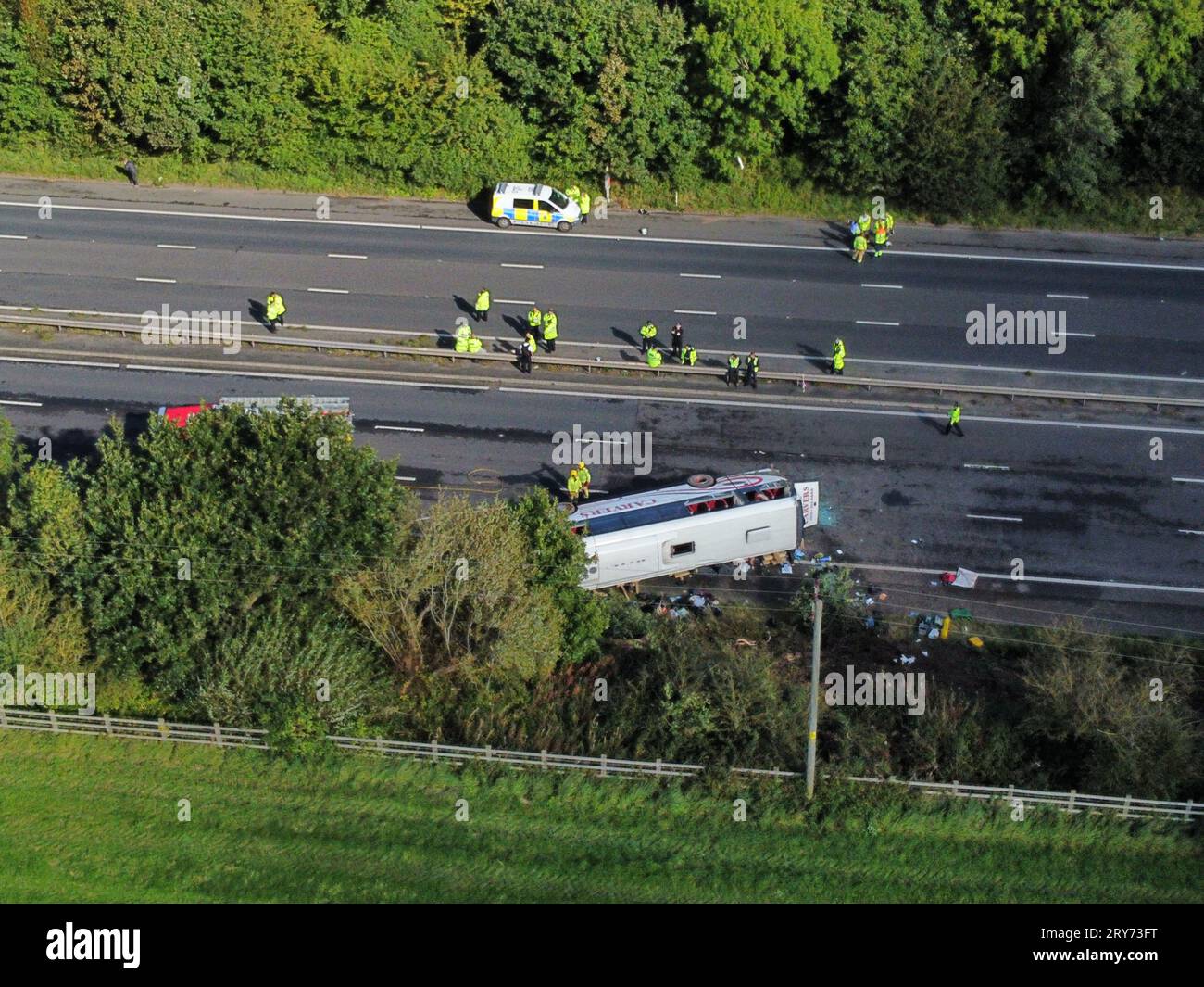 Emergency services at the scene of a coach crash on the M53 motorway ...