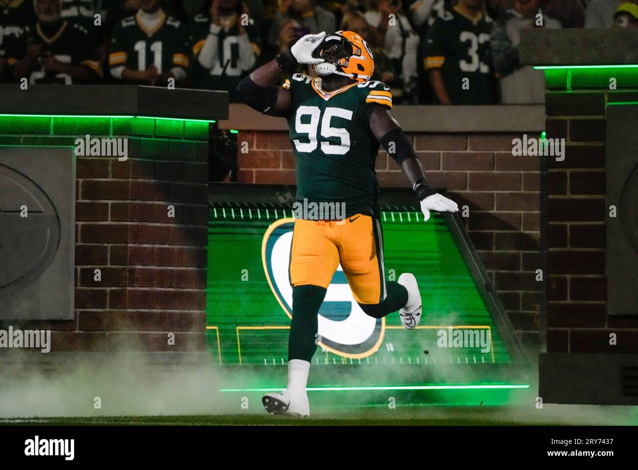 Green Bay Packers' Devonte Wyatt is introduced before an NFL football ...