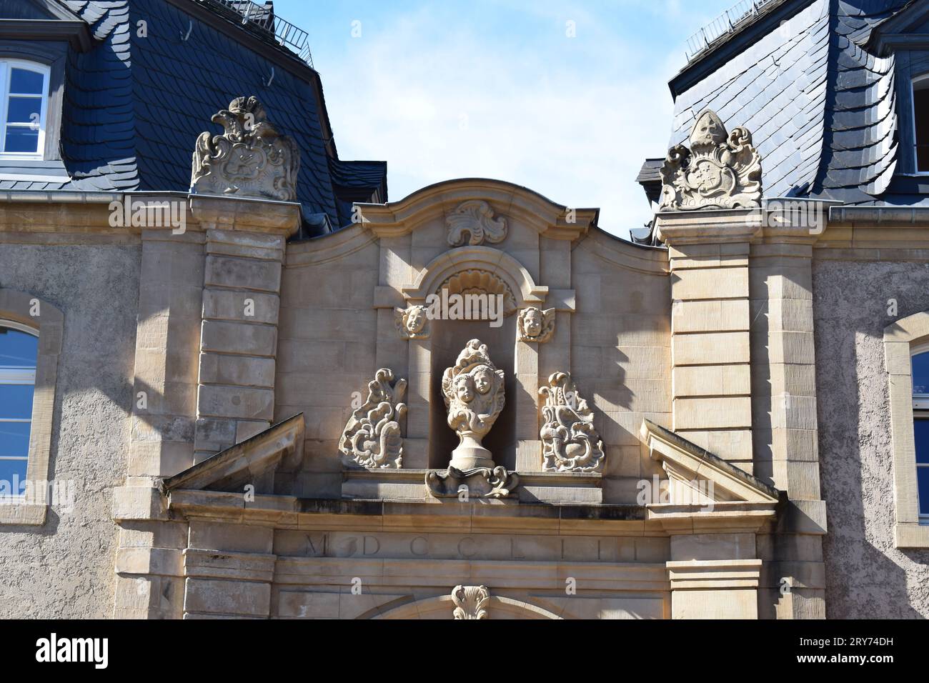 classic decoration on an arch gate to a public administration building ...