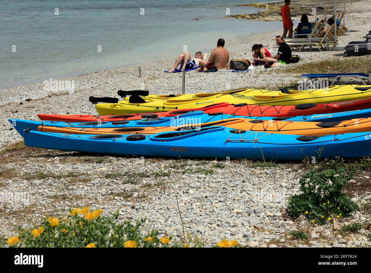Colourful kayaks on the shore at Skala, Agistri, Saronic Islands group ...