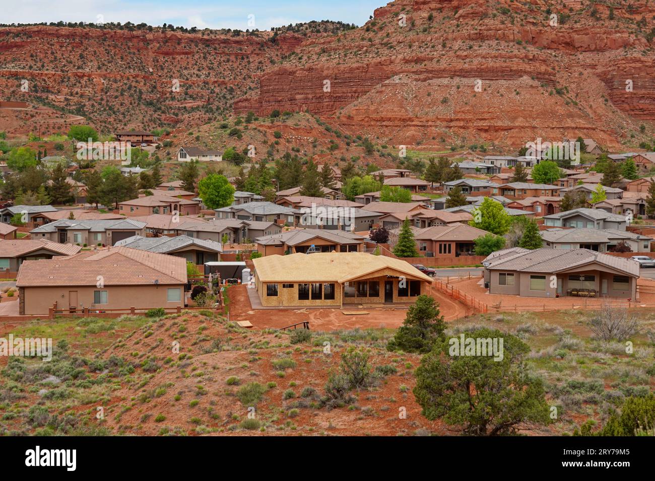 House under construction in a neighborhood Stock Photo - Alamy
