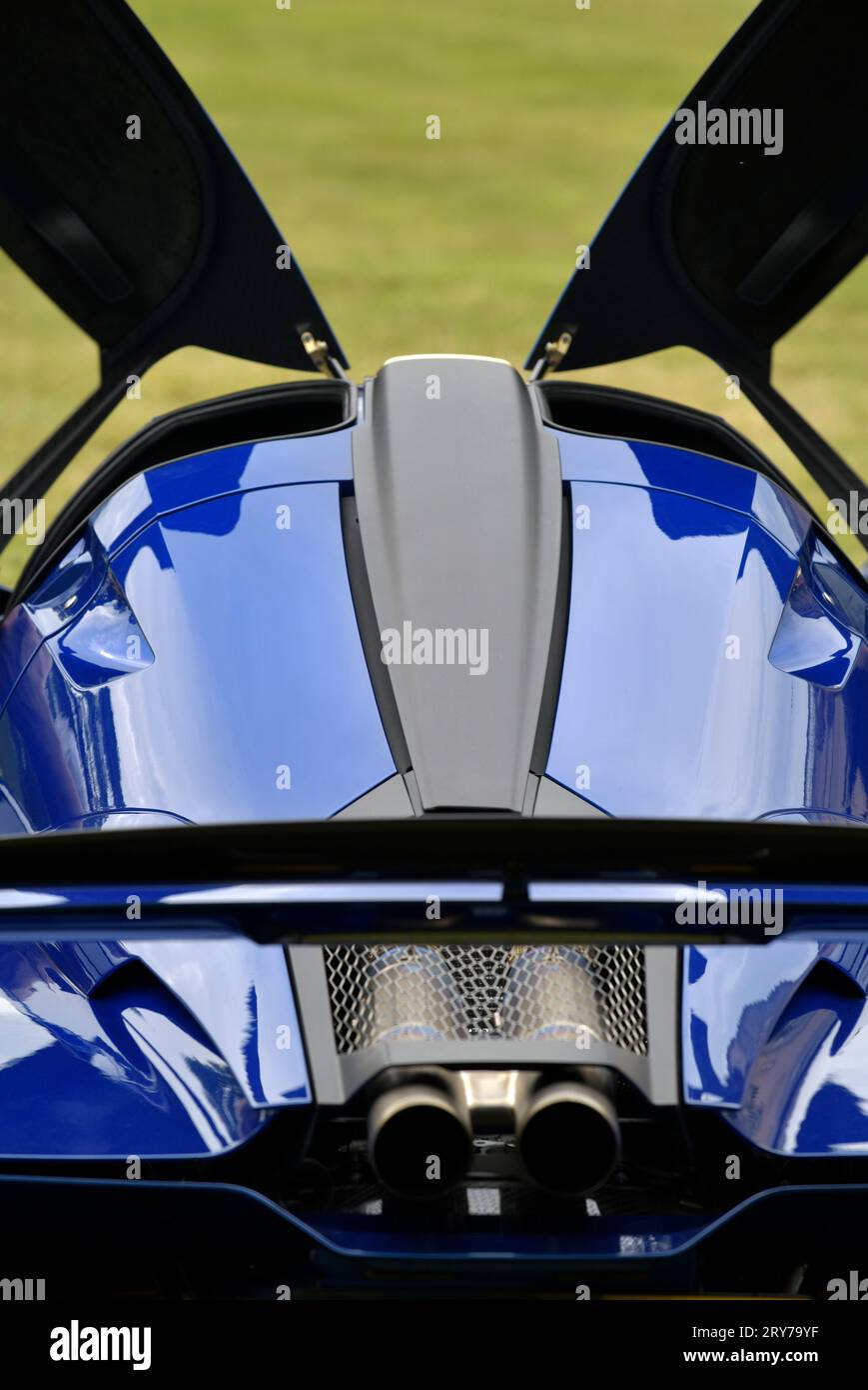 rear view of 2022 praga bohema super car with gull wing doors open ...