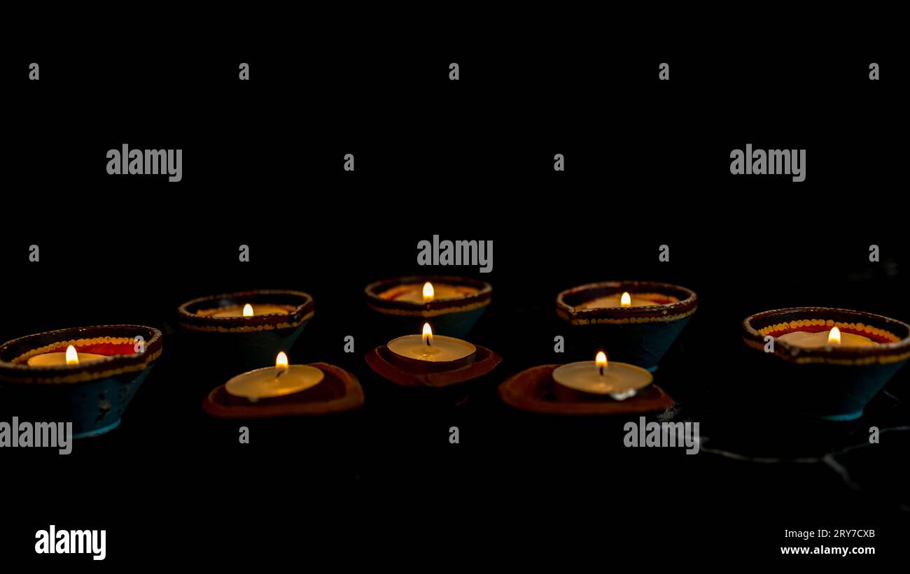 Happy Diwali - Clay Diya lamps lit during Deepavali, Hindu festival of ...