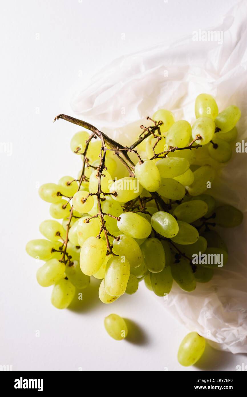 Sultana grapes in a biodegradable bag on a light background Stock Photo ...