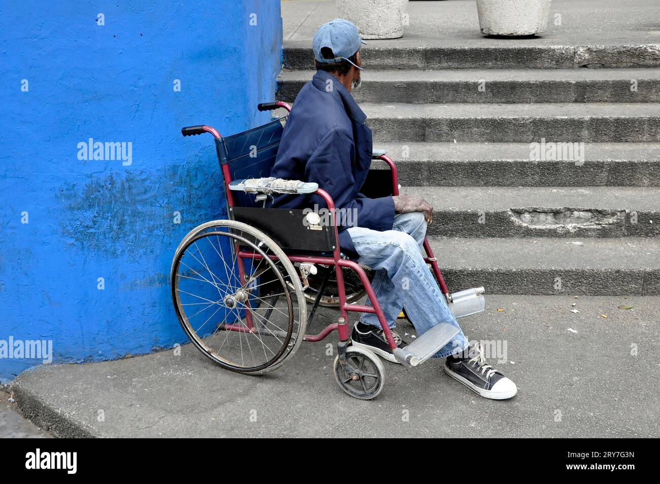 Beggar in wheelchair hi-res stock photography and images - Alamy