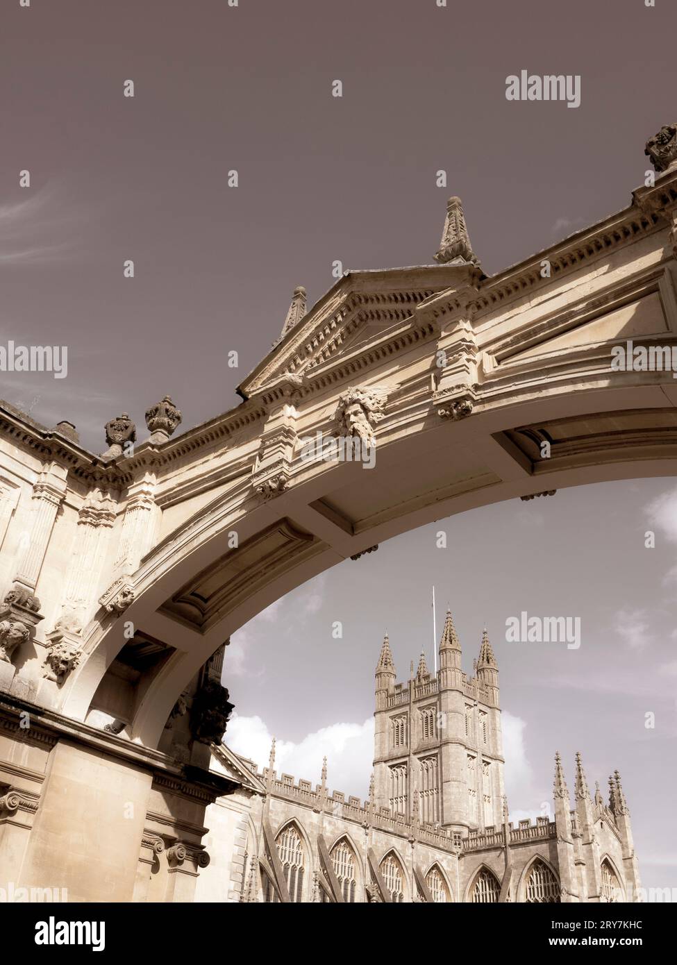 Archway of the Roman Baths, with view of Bath Abbey, Bath, Somerset ...