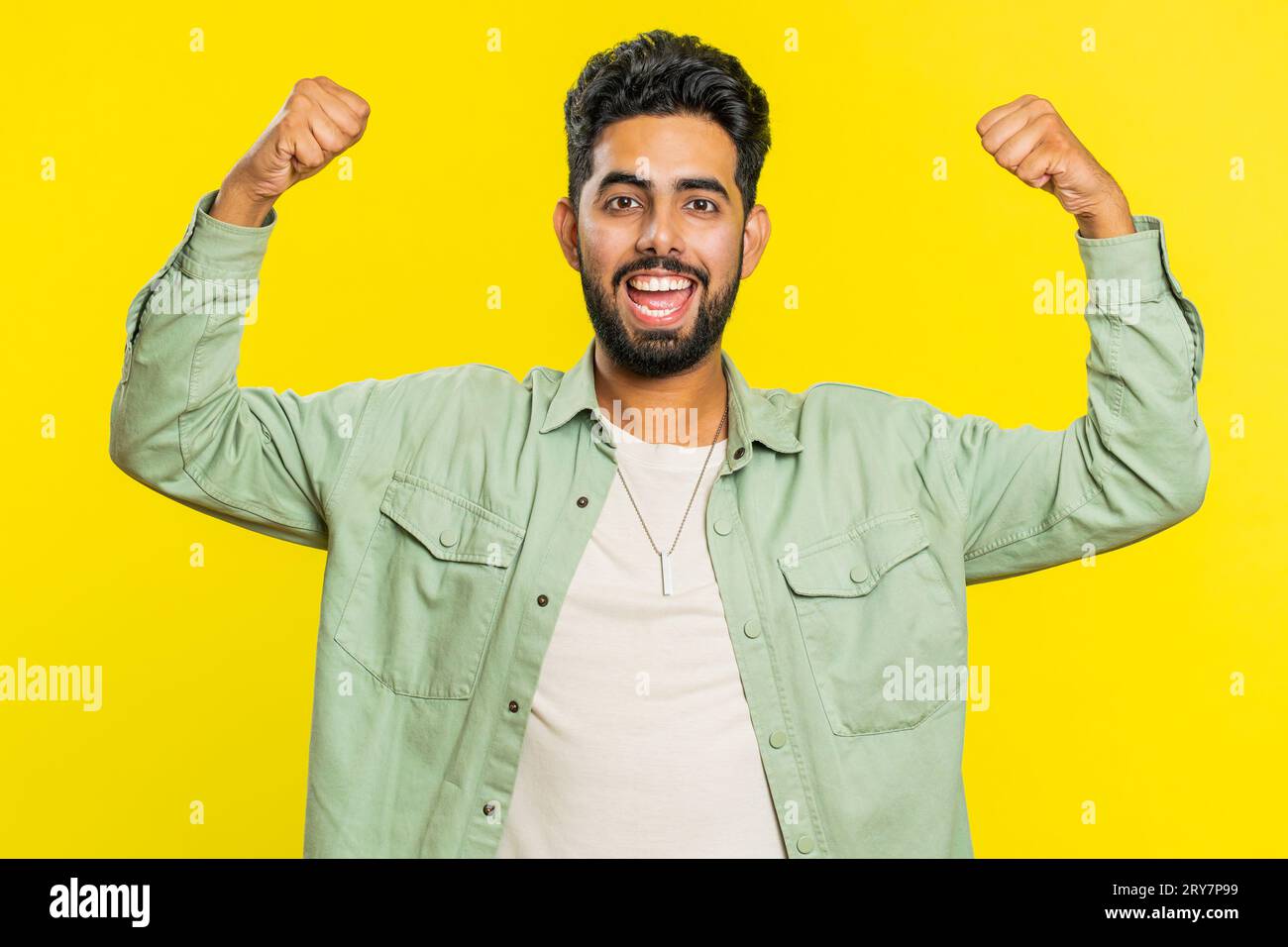 Happy joyful Indian man celebrating success victory, winning birthday ...