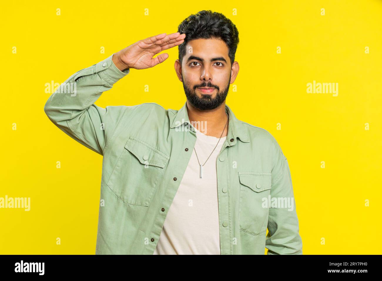 Yes sir. Subordinate responsible serious Indian man giving salute ...