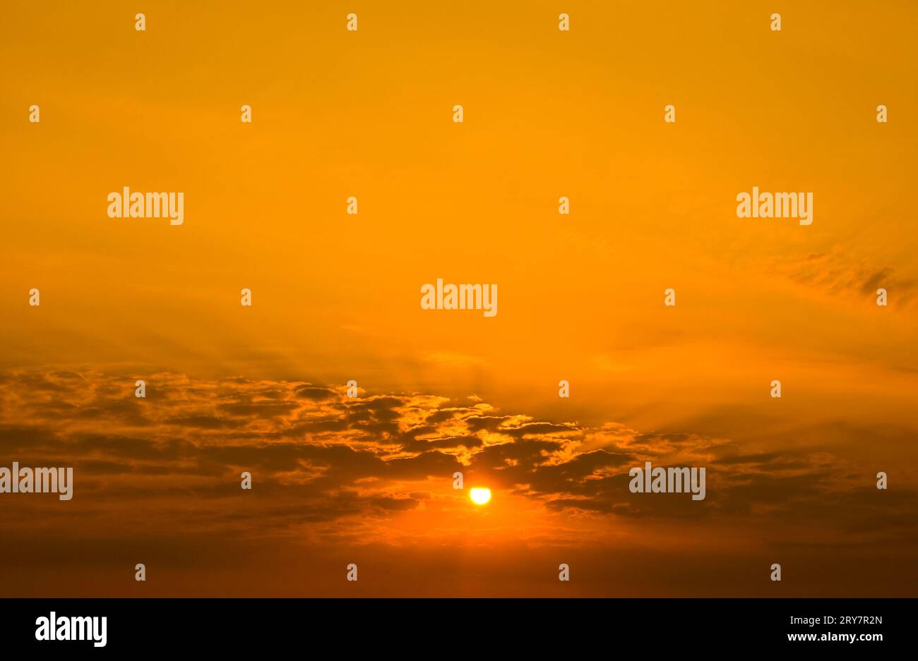 The rising sun has painted the sky in orange colour Stock Photo - Alamy