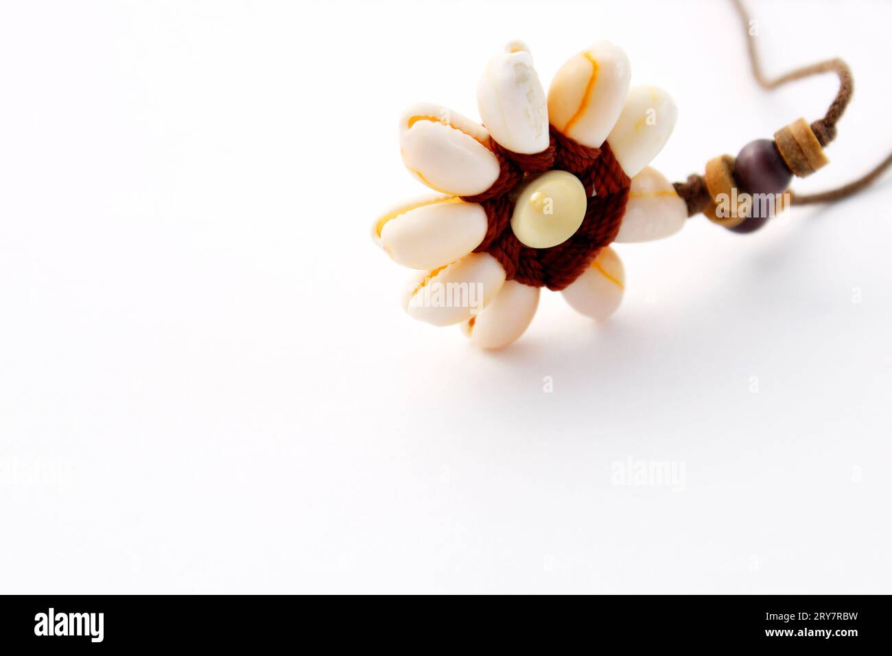 Necklace made with snails, string and wooden beads Stock Photo - Alamy