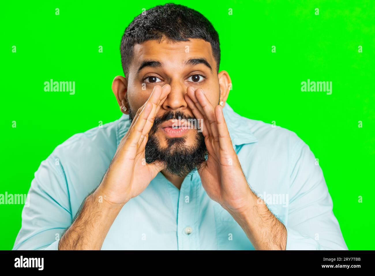 Keep my secrets, silence. Indian man whisper news rumors holding hands ...