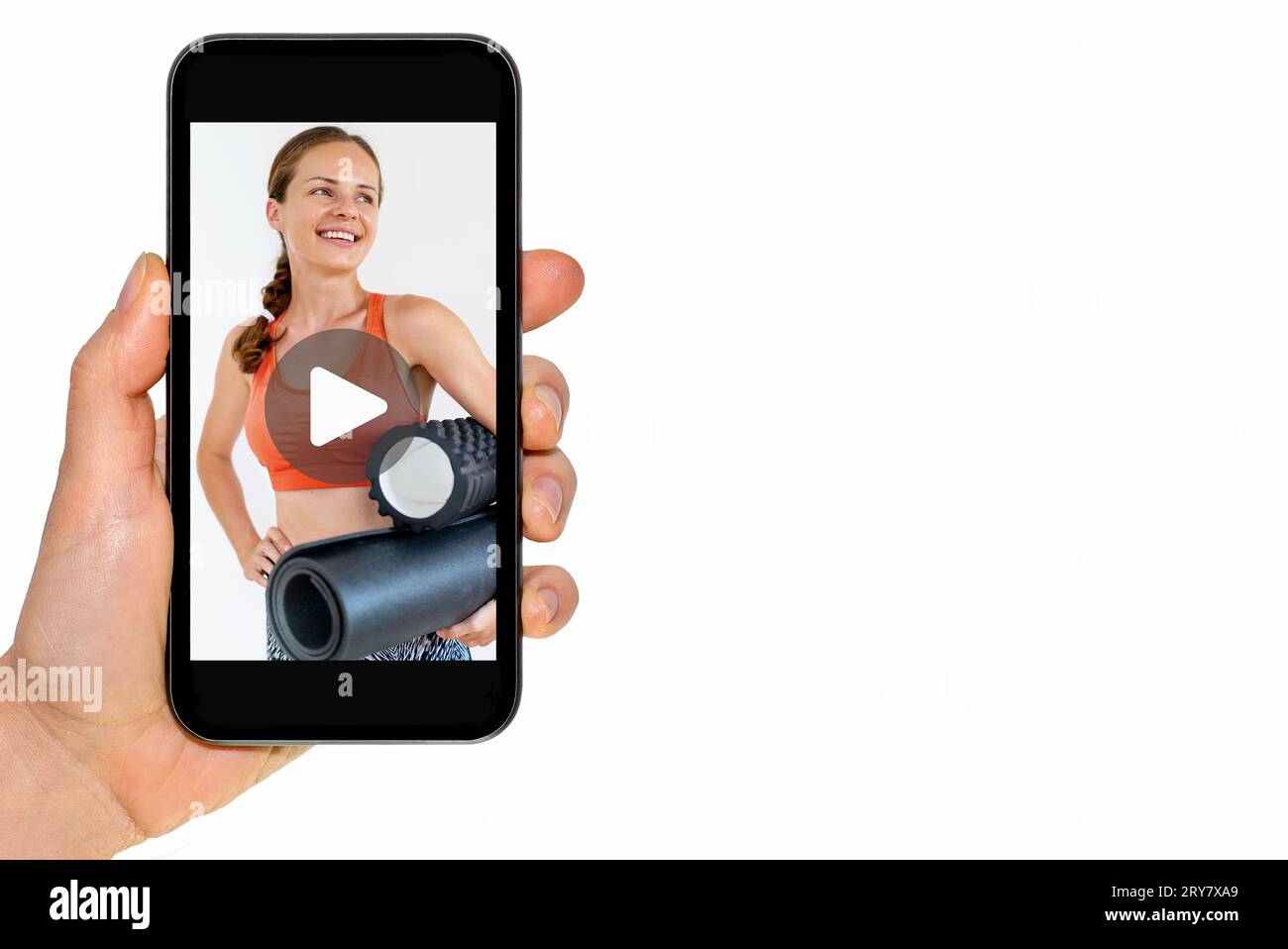 Isolated hand with smart phone, athletic female fitness couch on screen ...