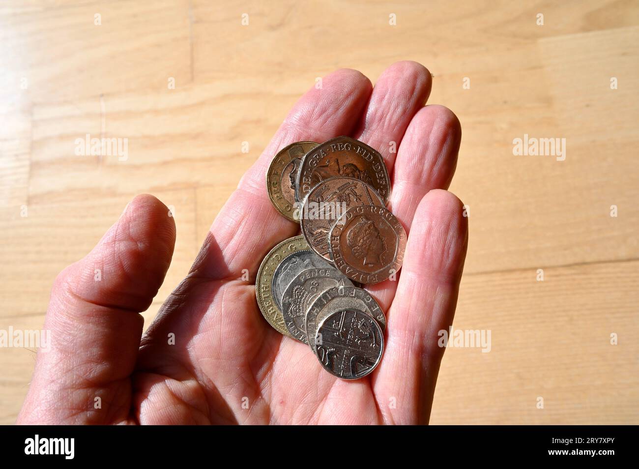 Assorted loose change Stock Photo - Alamy