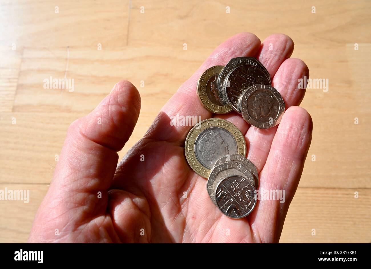 Assorted loose change Stock Photo - Alamy