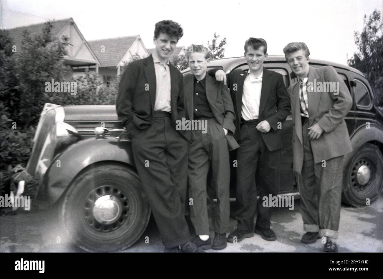1960s, historical, outside at a holiday camp, male youths dressed up ...