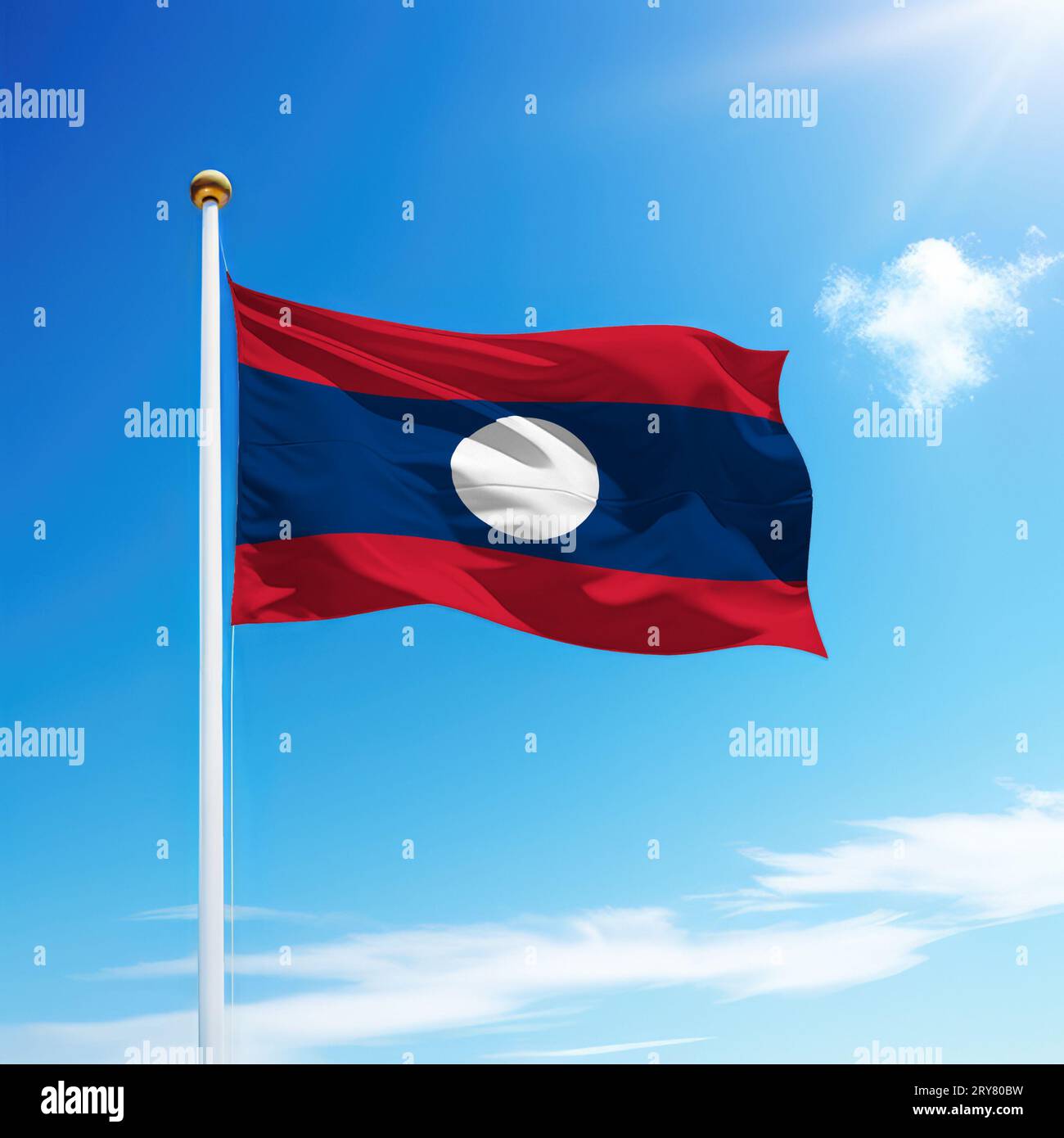 Waving flag of Laos on flagpole with sky background. Template for ...