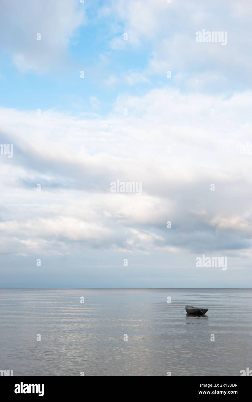 Seascape morning calm water boat hi-res stock photography and images ...