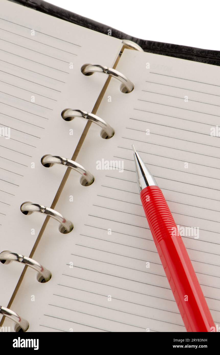 Note book and pencil Stock Photo - Alamy