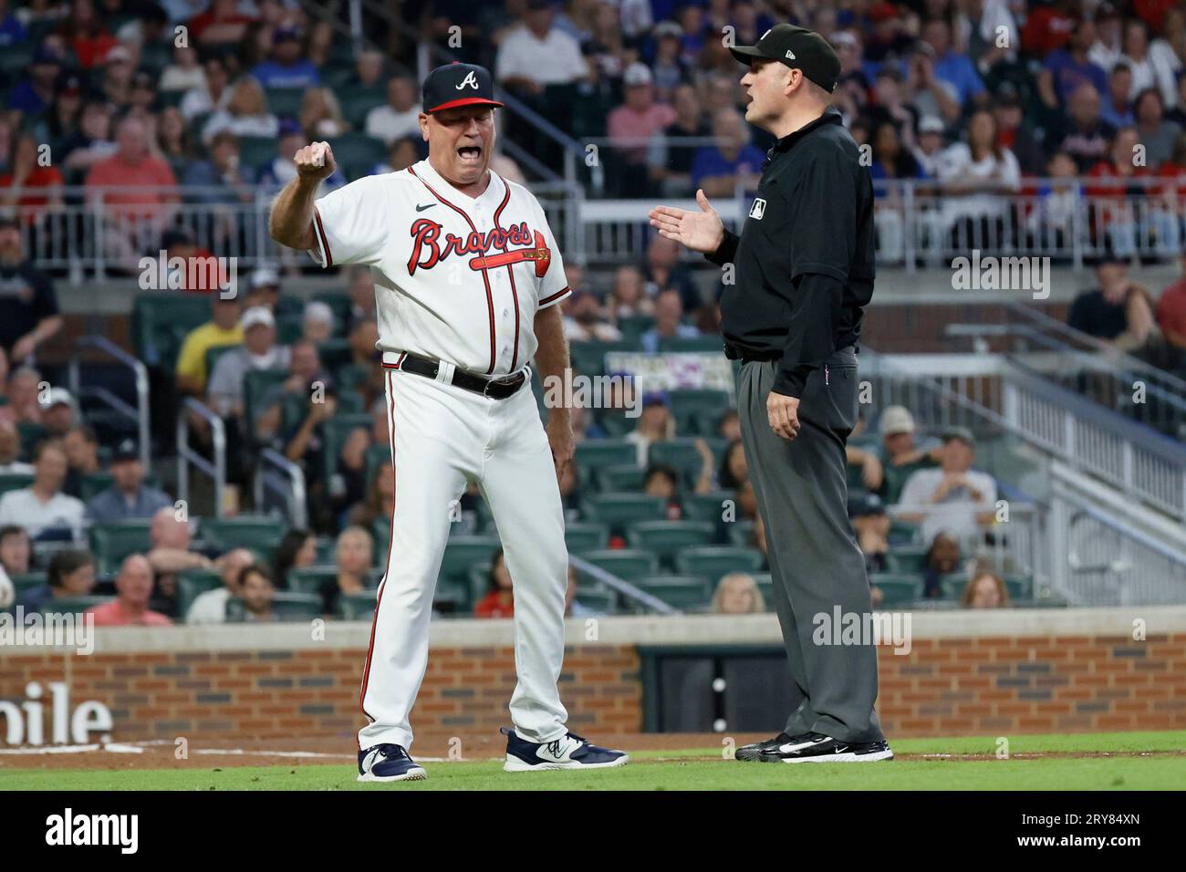 Atlanta Braves manager Brian Snitker (43) gets into a heated ...