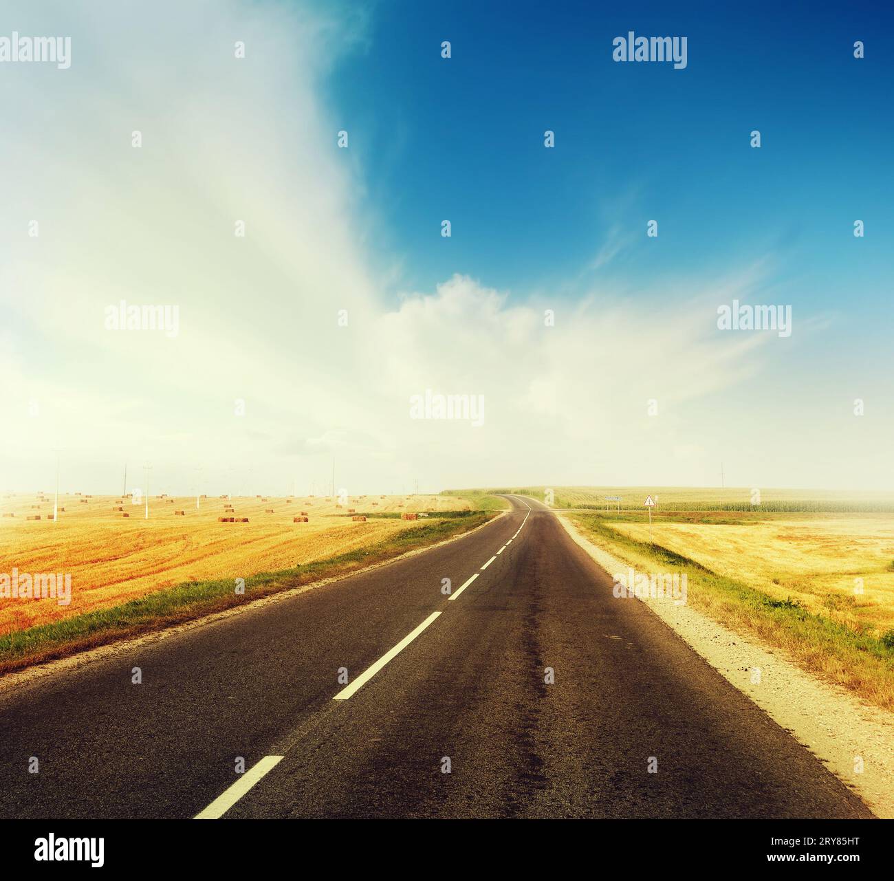 Empty asphalt road across hi-res stock photography and images - Alamy