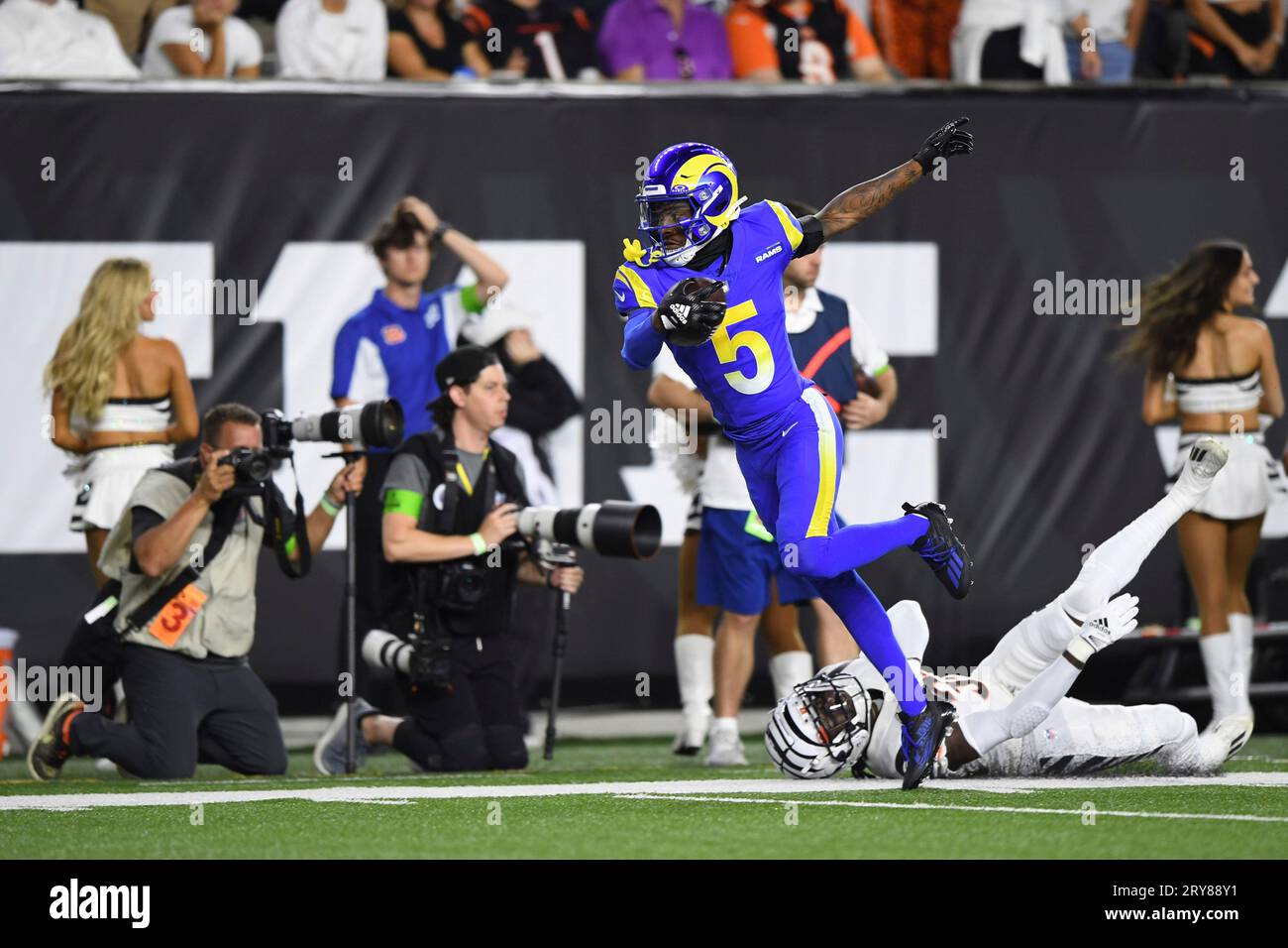 Los Angeles Rams wide receiver Tutu Atwell (5) carries the ball during an NFL football game ...