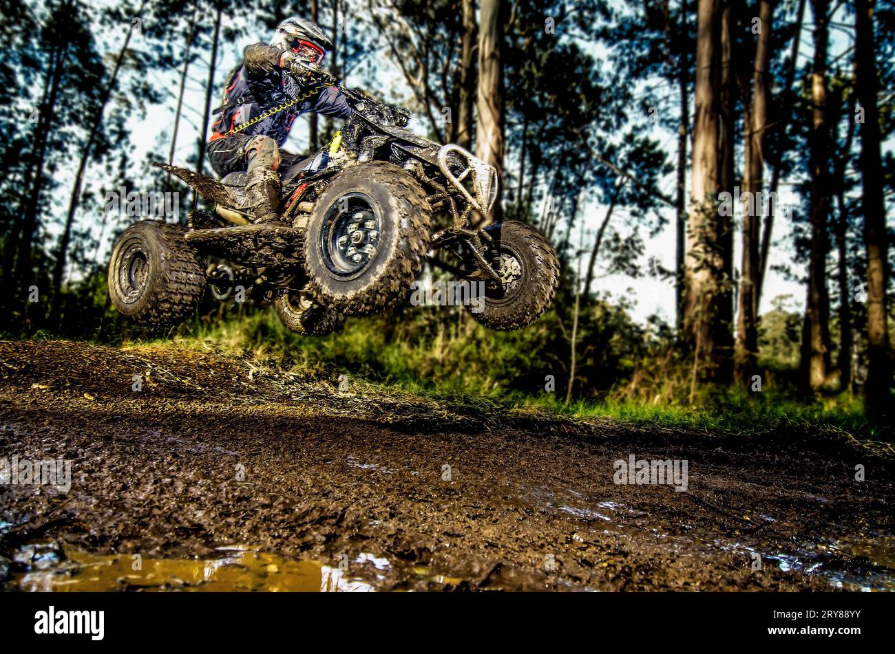 Quad rider jumping Stock Photo - Alamy