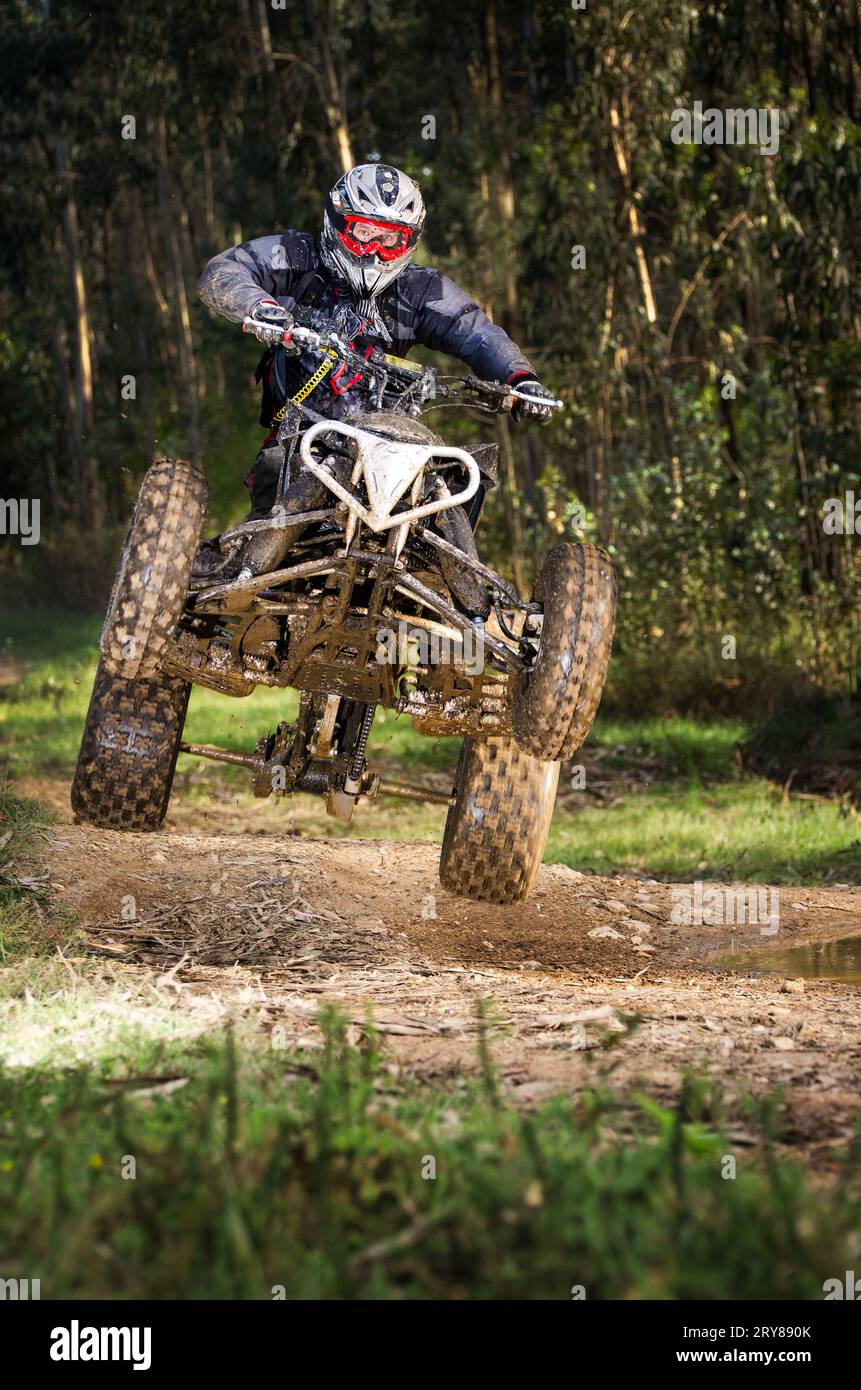 Quad rider jumping Stock Photo - Alamy