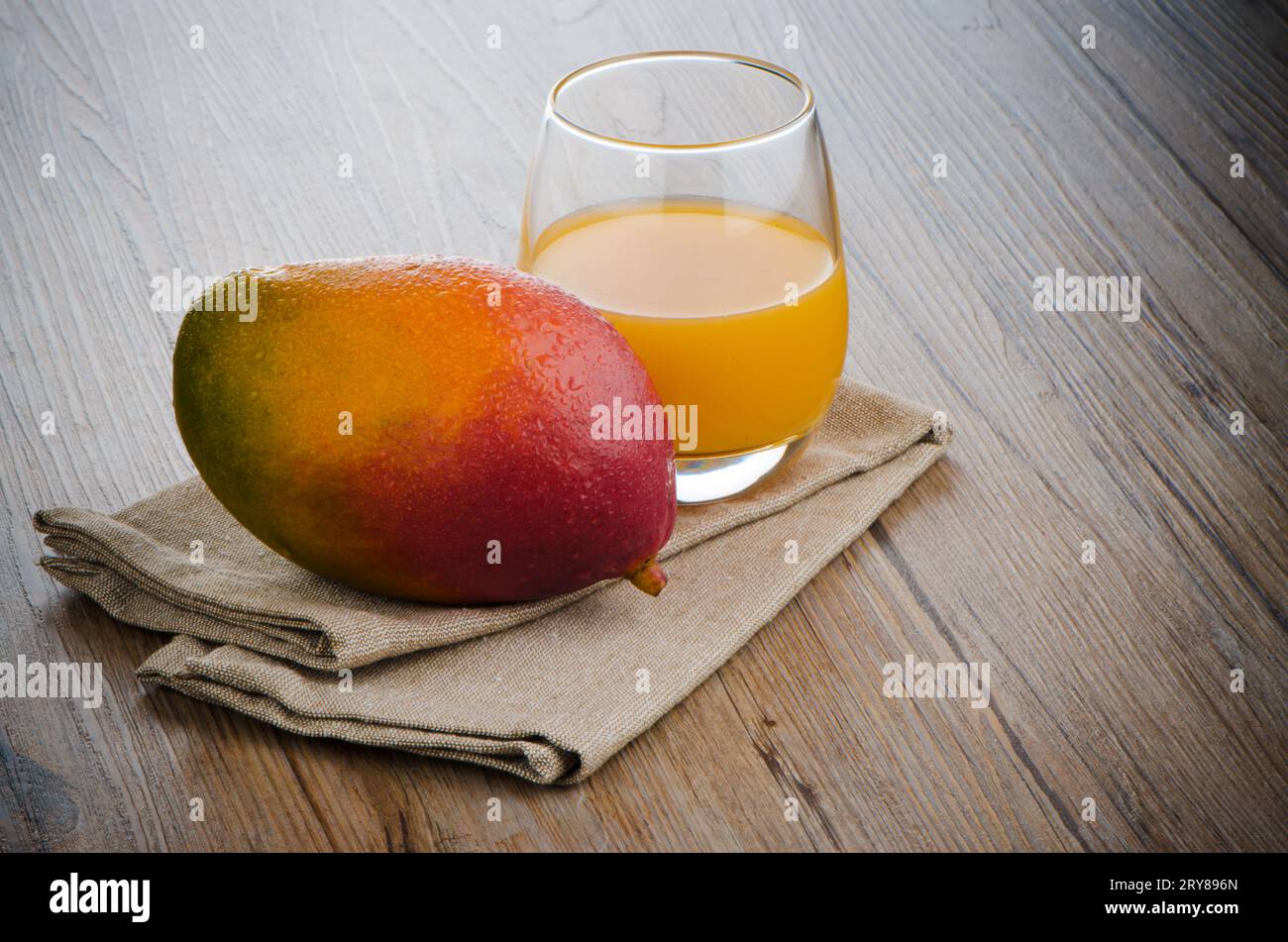 Fresh mango juice Stock Photo - Alamy
