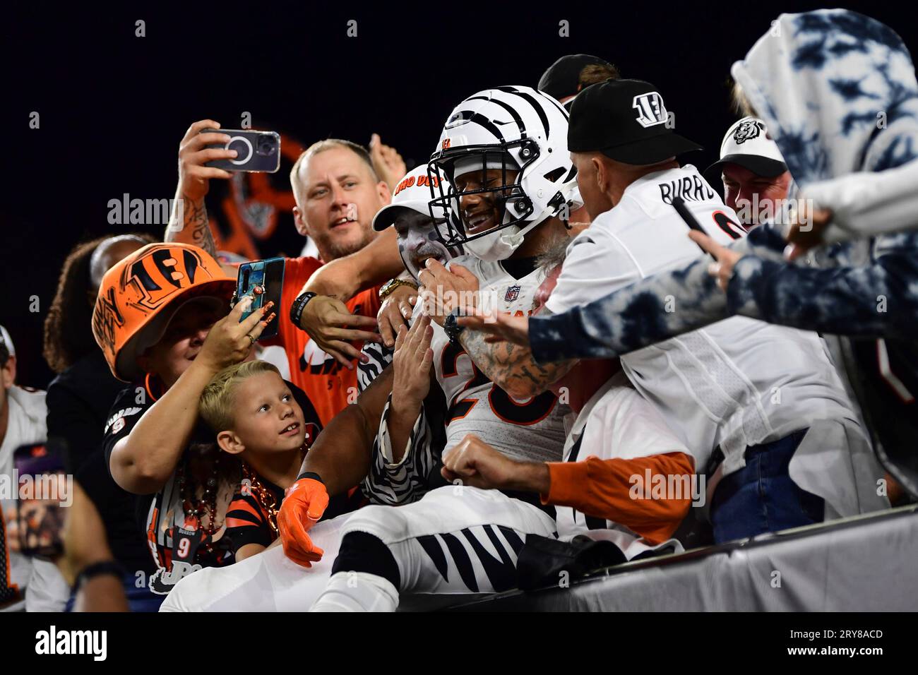 Cincinnati Bengals running back Joe Mixon (28) celebrates with fans ...