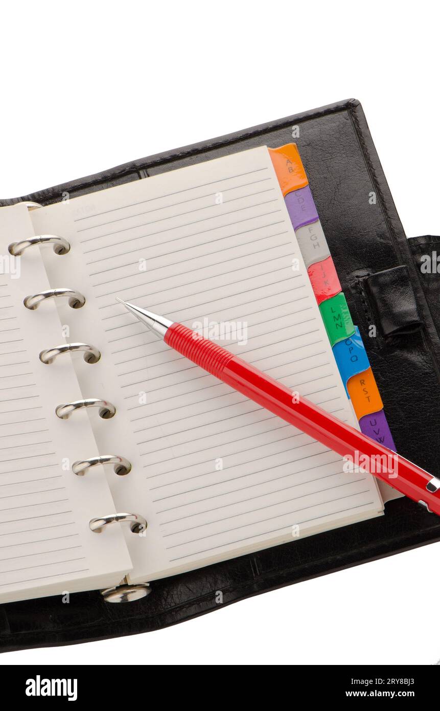 Note book and pencil Stock Photo - Alamy