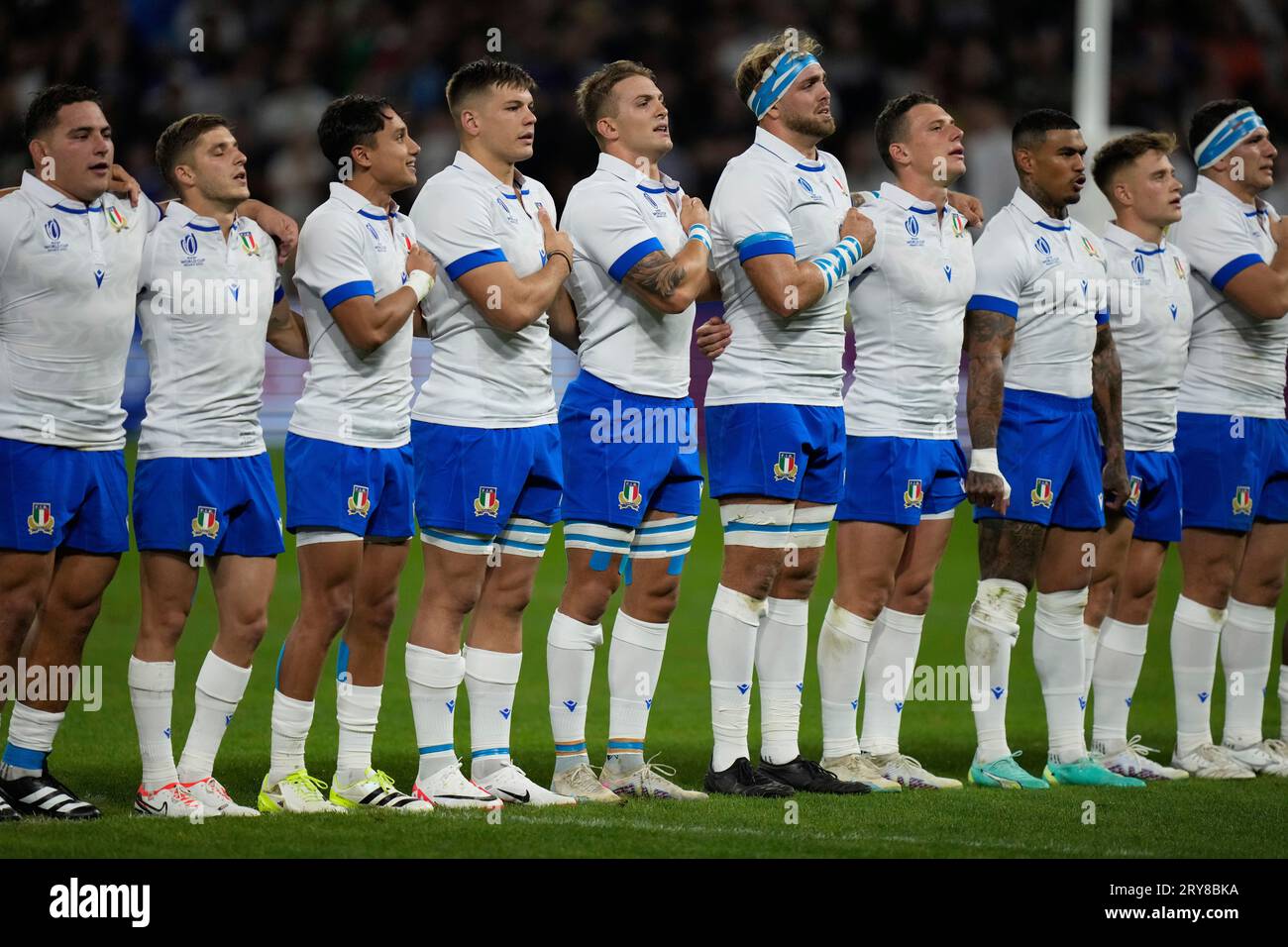Members of the Italy's team line up for the national anthem ahead of ...