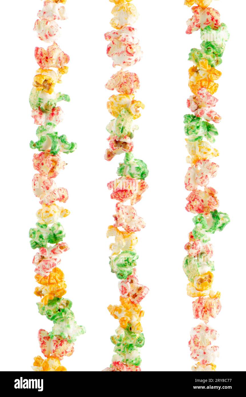 Popped color kernels on three rows Stock Photo - Alamy