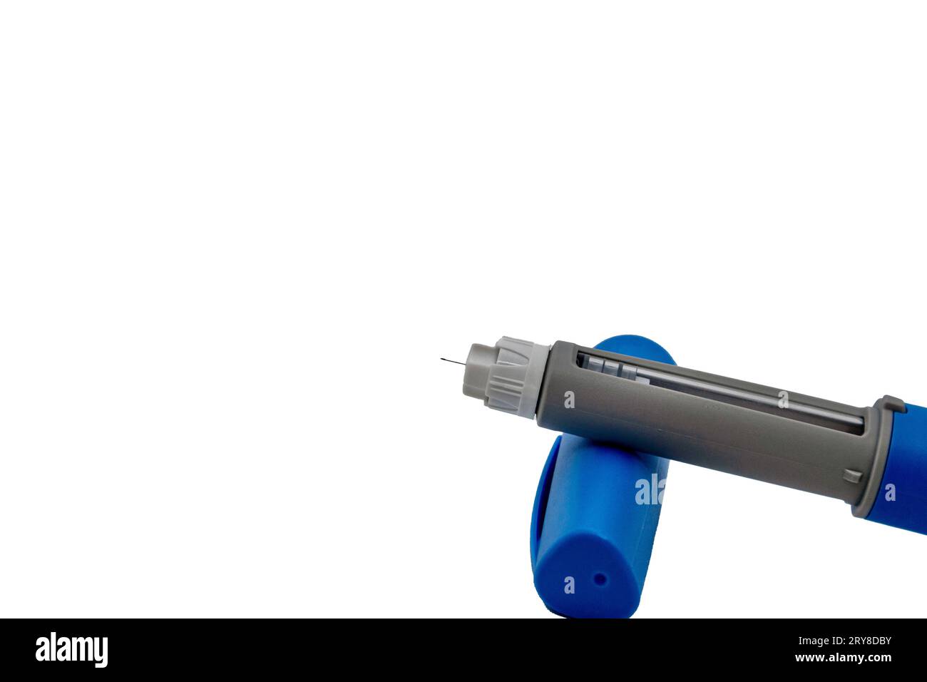 Blue Medical Autoinjector pen close up on white background with copy ...