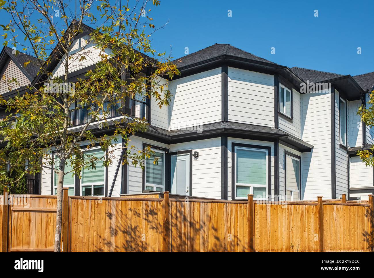 Big house with the fence around. Real Estate Exterior Front House on a ...