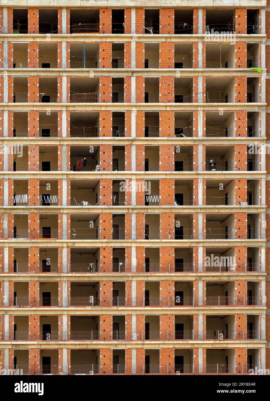 Front view of a large construction site with multistory residential ...