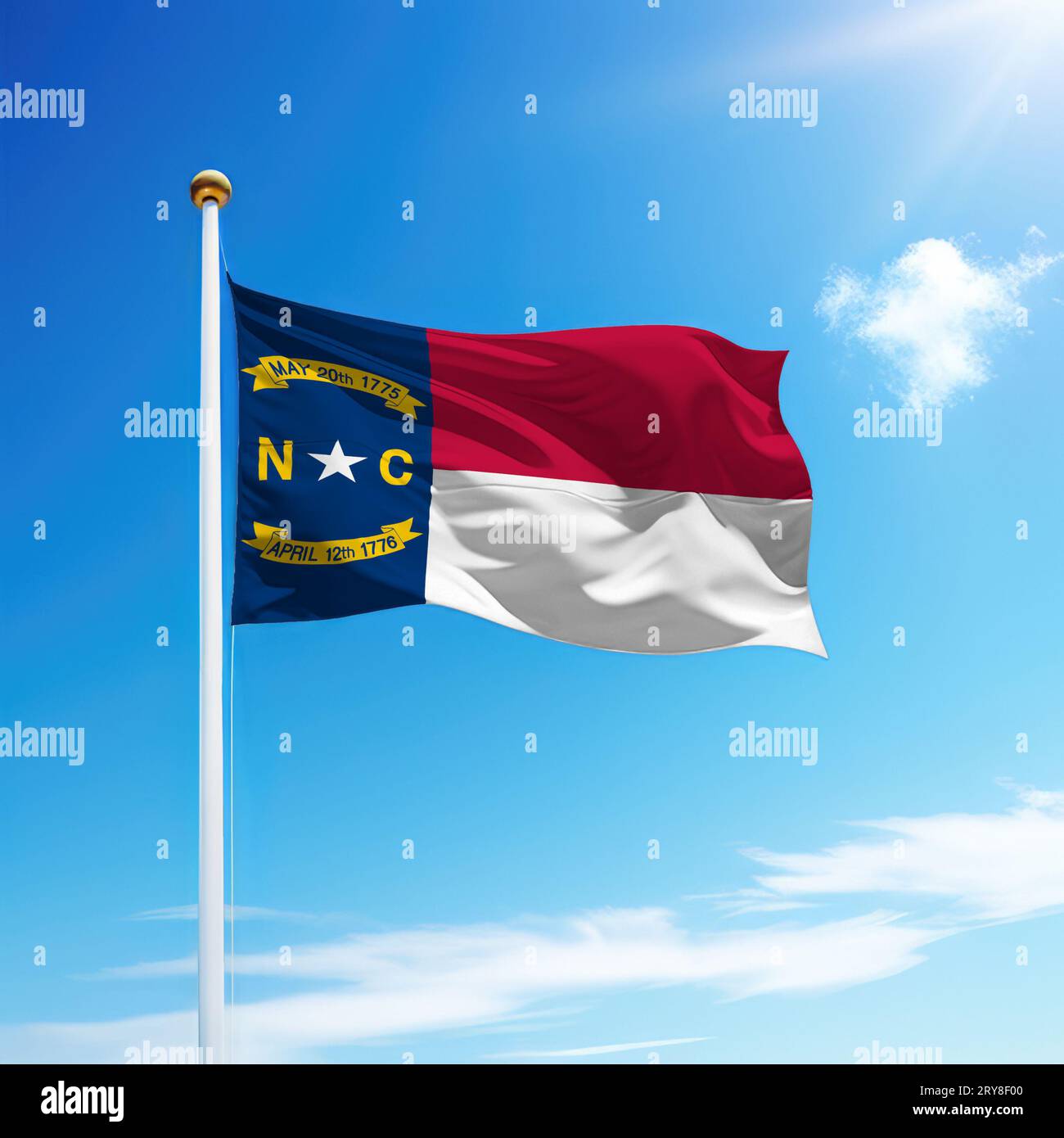 Waving flag of North Carolina is a state of United States on flagpole ...