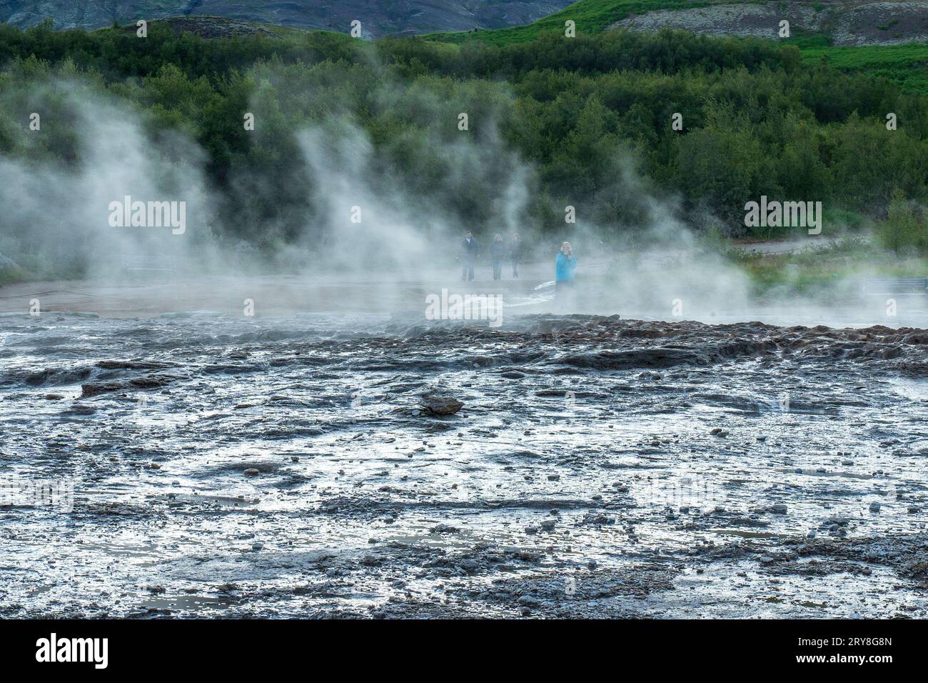 Vapor mist in seen after the eruption of Strokkur, a fountain-type ...
