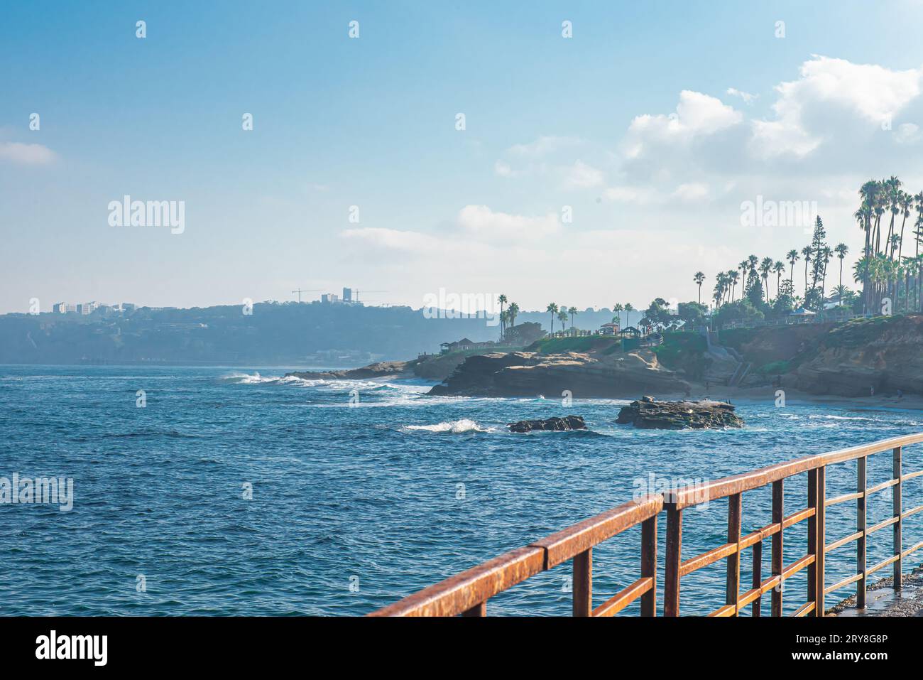 curved ocean pier with waves Stock Photo - Alamy
